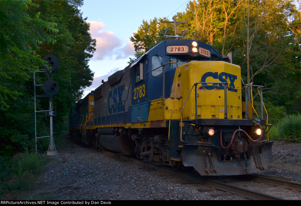 CSX GP38-2 2783 leads C764-26 under beautiful skies